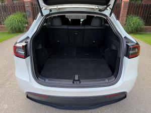 Balts Tesla Model Y 2023 Klaipėda, ar dzinēja tilpumu 0.00 L un nobraukumu 54 tūkst. km par 33000 €, foto 22 vietnē AUTOMOTO.COM.LV