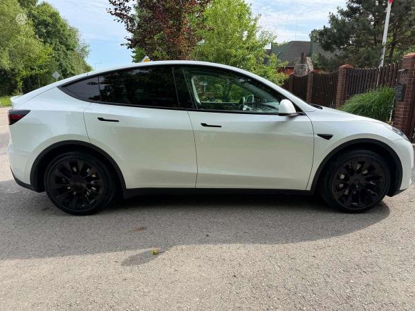 Balts Tesla Model Y 2023 Klaipėda, ar dzinēja tilpumu 0.00 L un nobraukumu 54 tūkst. km par 33000 €, foto 4 vietnē AUTOMOTO.COM.LV