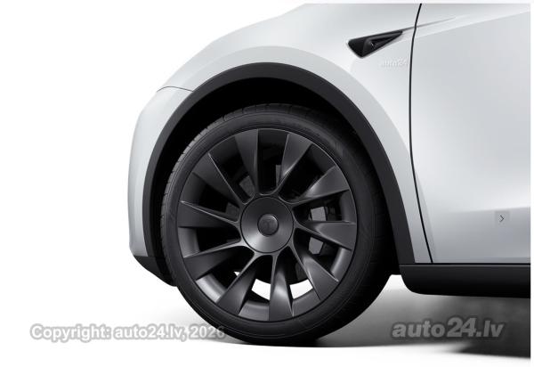 White Tesla Model Y 2023 in Tallinn, with an engine capacity of 0.00 L and mileage of 77 thousand km for 38490 €, photo 5 on AUTOMOTO.COM.LV