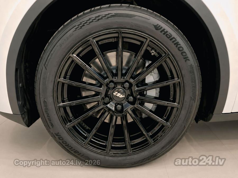 Balts Tesla Model Y 2023 Tallina, ar dzinēja tilpumu 0.00 L un nobraukumu 78 tūkst. km par 34900 €, foto 5 vietnē AUTOMOTO.COM.LV