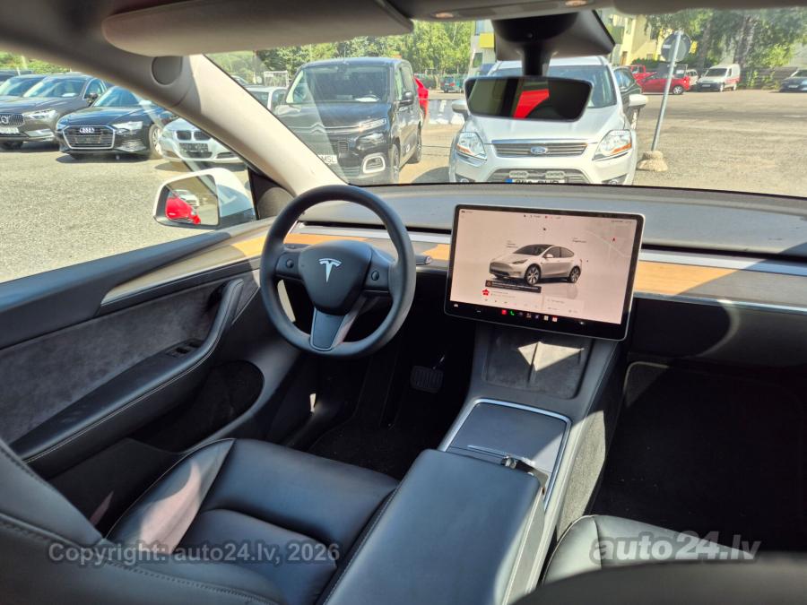 Белый Тесла Модель Y 2023 в Тарту, объемом двигателя 0.00 л и пробегом 62 тыс. км за 33390 €, фото 5 на AUTOMOTO.COM.LV