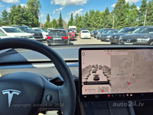 White Tesla Model Y 2023 in Tartu, with an engine capacity of 0.00 L and mileage of 62 thousand km for 33390 €, photo 6 on AUTOMOTO.COM.LV