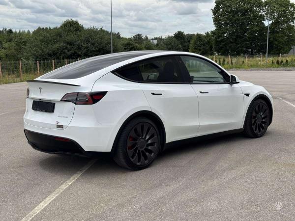 Balts Tesla Model Y 2023 Viļņa, ar dzinēja tilpumu 0.00 L un nobraukumu 78 tūkst. km par 38500 €, foto 4 vietnē AUTOMOTO.COM.LV