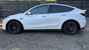 Balts Tesla Model Y 2023 Jonava, ar dzinēja tilpumu 0.00 L un nobraukumu 138 tūkst. km par 17999 €, foto 5 vietnē AUTOMOTO.COM.LV