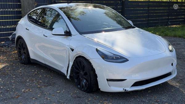 Balts Tesla Model Y 2023 Jonava, ar dzinēja tilpumu 0.00 L un nobraukumu 138 tūkst. km par 17500 €, foto 7 vietnē AUTOMOTO.COM.LV