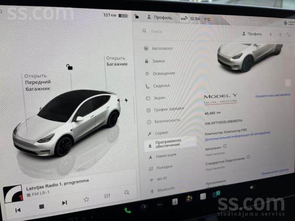 White Tesla Model Y 2024 in Riga, with an engine capacity of 0.00 L and mileage of 47 thousand km for 38000 €, photo 5 on AUTOMOTO.COM.LV