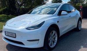 White Tesla Model Y 2024 in Vilnius, with an engine capacity of 0.00 L and mileage of 54 thousand km for 38950 €, photo 5 on AUTOMOTO.COM.LV