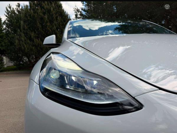 Balts Tesla Model Y 2024 Viļņa, ar dzinēja tilpumu 0.00 L un nobraukumu 54 tūkst. km par 38950 €, foto 5 vietnē AUTOMOTO.COM.LV