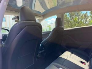 White Tesla Model Y 2024 in Vilnius, with an engine capacity of 0.00 L and mileage of 54 thousand km for 38950 €, photo 13 on AUTOMOTO.COM.LV