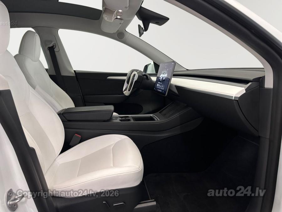 Balts Tesla Model Y 2024 Tallina, ar dzinēja tilpumu 0.00 L un nobraukumu 88 tūkst. km par 39900 €, foto 18 vietnē AUTOMOTO.COM.LV