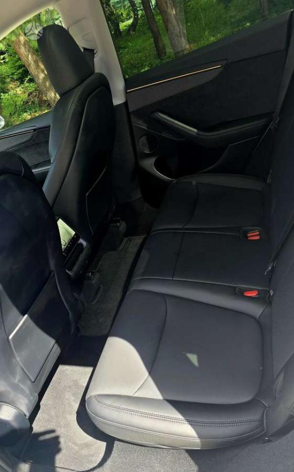 White Tesla Model Y 2025 in Palanga, with an engine capacity of 0.00 L and mileage of 21 thousand km for 52000 €, photo 9 on AUTOMOTO.COM.LV