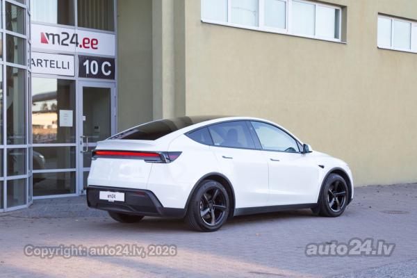 White Tesla Model Y 2025 in Tallinn, with an engine capacity of 0.00 L and mileage of 60 thousand km for 49500 €, photo 4 on AUTOMOTO.COM.LV