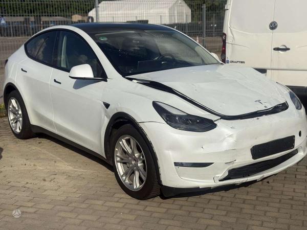Balts Tesla Model Y 2022 Marijampole, ar dzinēja tilpumu 0.00 L un nobraukumu 74 tūkst. km par 21300 €, foto 1 vietnē AUTOMOTO.COM.LV