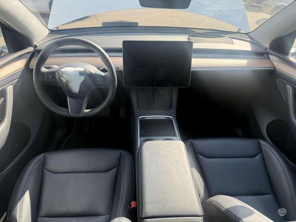 White Tesla Model Y 2022 in Marijampole, with an engine capacity of 0.00 L and mileage of 74 thousand km for 21300 €, photo 7 on AUTOMOTO.COM.LV