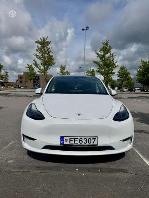 White Tesla Model Y 2022 in Klaipeda, with an engine capacity of 0.00 L and mileage of 69 thousand km for 28600 €, photo 4 on AUTOMOTO.COM.LV