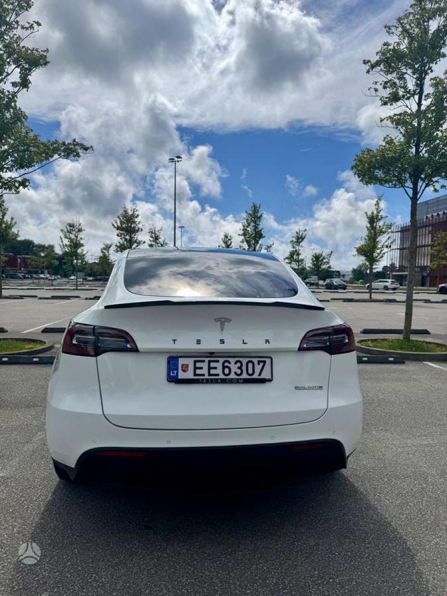 White Tesla Model Y 2022 in Klaipeda, with an engine capacity of 0.00 L and mileage of 69 thousand km for 28600 €, photo 8 on AUTOMOTO.COM.LV
