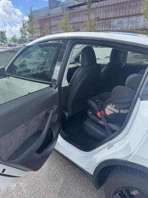 White Tesla Model Y 2022 in Klaipeda, with an engine capacity of 0.00 L and mileage of 69 thousand km for 28600 €, photo 12 on AUTOMOTO.COM.LV