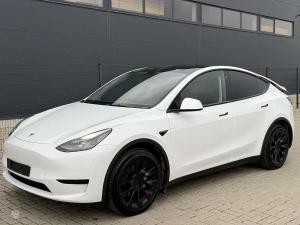 White Tesla Model Y 2022 in Kaunas, with an engine capacity of 0.00 L and mileage of 49 thousand km for 19300 €, photo  on AUTOMOTO.COM.LV