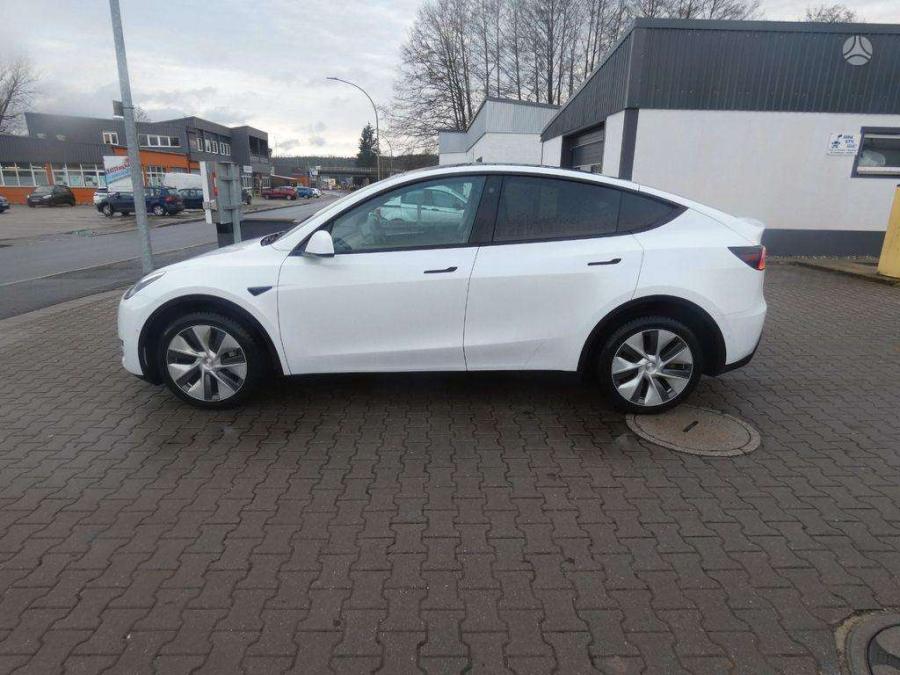 Balts Tesla Model Y 2022 Viļņa, ar dzinēja tilpumu 0.00 L un nobraukumu 99 tūkst. km par 35000 €, foto 7 vietnē AUTOMOTO.COM.LV