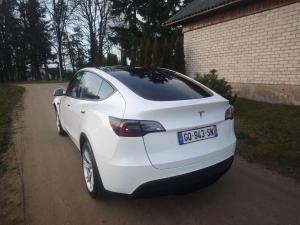 Balts Tesla Model Y 2023 Telšiai, ar dzinēja tilpumu 0.00 L un nobraukumu 41 tūkst. km par 14999 €, foto 4 vietnē AUTOMOTO.COM.LV