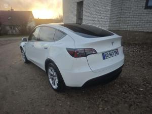 Balts Tesla Model Y 2023 Telšiai, ar dzinēja tilpumu 0.00 L un nobraukumu 41 tūkst. km par 14999 €, foto 9 vietnē AUTOMOTO.COM.LV