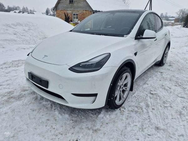 White Tesla Model Y 2023 in Marijampole, with an engine capacity of 0.00 L and mileage of 71 thousand km for 19600 €, photo 9 on AUTOMOTO.COM.LV