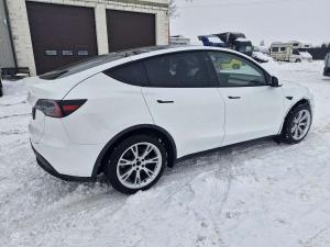 White Tesla Model Y 2023 in Marijampole, with an engine capacity of 0.00 L and mileage of 71 thousand km for 19600 €, photo 16 on AUTOMOTO.COM.LV
