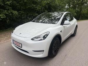 White Tesla Model Y 2023 in Marijampole, with an engine capacity of 0.00 L and mileage of 105 thousand km for 29040 €, photo  on AUTOMOTO.COM.LV