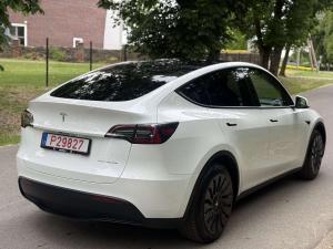White Tesla Model Y 2023 in Marijampole, with an engine capacity of 0.00 L and mileage of 105 thousand km for 29040 €, photo 6 on AUTOMOTO.COM.LV