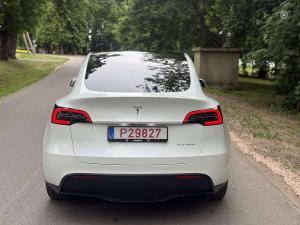 White Tesla Model Y 2023 in Marijampole, with an engine capacity of 0.00 L and mileage of 105 thousand km for 29040 €, photo 7 on AUTOMOTO.COM.LV