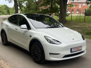 White Tesla Model Y 2023 in Marijampole, with an engine capacity of 0.00 L and mileage of 105 thousand km for 29040 €, photo 8 on AUTOMOTO.COM.LV