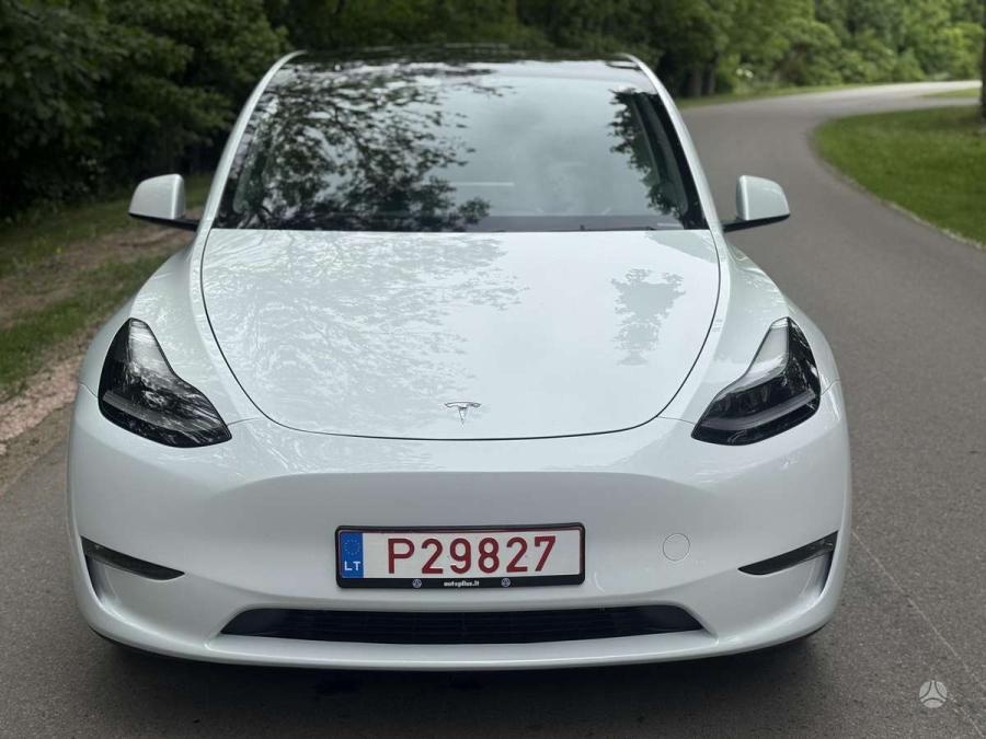 White Tesla Model Y 2023 in Marijampole, with an engine capacity of 0.00 L and mileage of 105 thousand km for 29040 €, photo 9 on AUTOMOTO.COM.LV