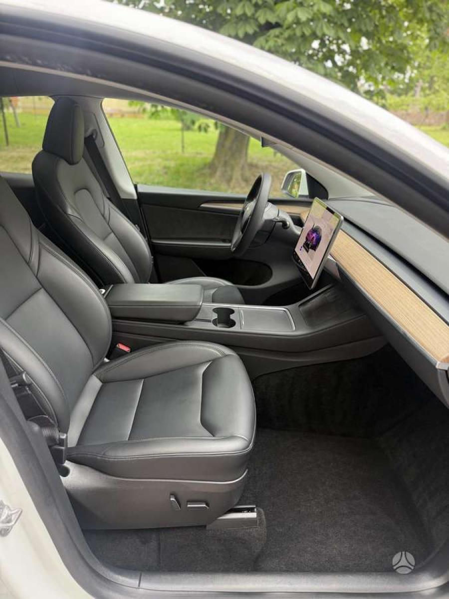 White Tesla Model Y 2023 in Marijampole, with an engine capacity of 0.00 L and mileage of 105 thousand km for 29040 €, photo 14 on AUTOMOTO.COM.LV