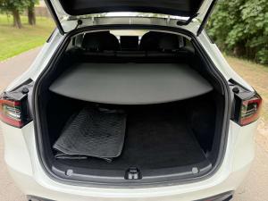 White Tesla Model Y 2023 in Marijampole, with an engine capacity of 0.00 L and mileage of 105 thousand km for 29040 €, photo 18 on AUTOMOTO.COM.LV