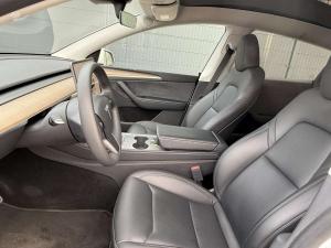 White Tesla Model Y 2023 in Kaunas, with an engine capacity of 0.00 L and mileage of 56 thousand km for 20900 €, photo 18 on AUTOMOTO.COM.LV