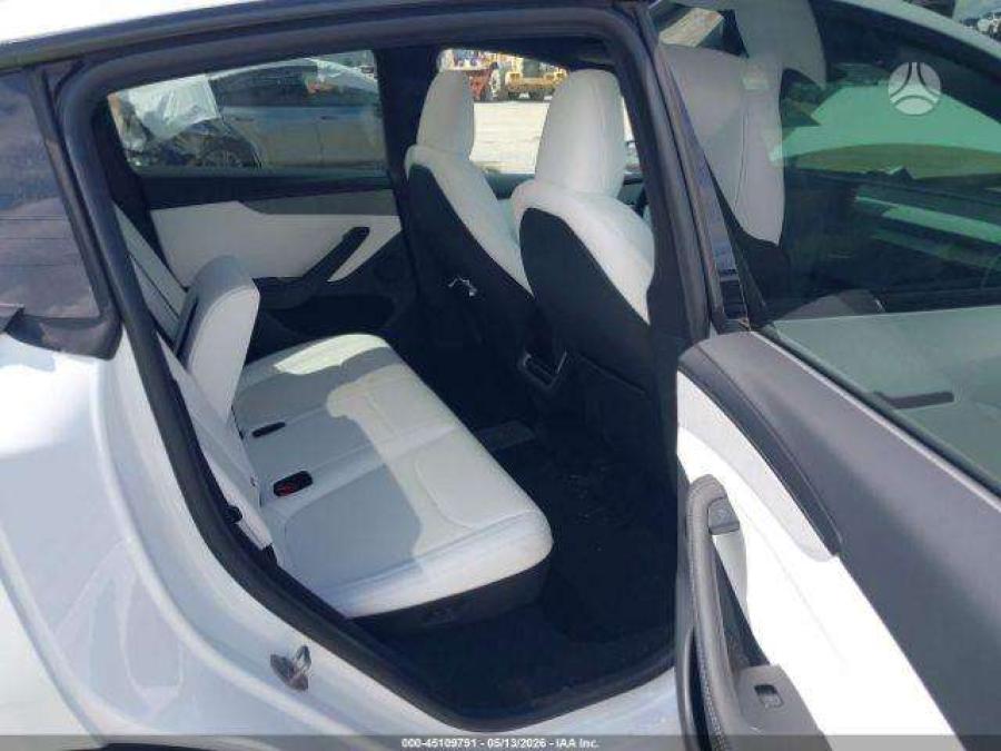 White Tesla Model Y 2026 in Kaunas, with an engine capacity of 0.00 L and mileage of 10 thousand km for 29300 €, photo 11 on AUTOMOTO.COM.LV