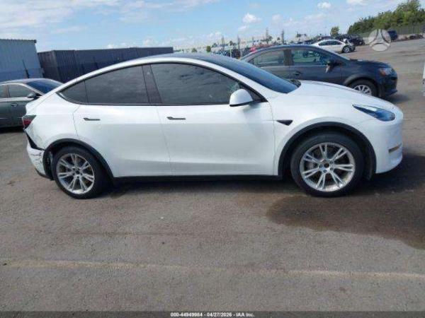 White Tesla Model Y 2021 in Klaipeda, with an engine capacity of 0.00 L and mileage of 168 thousand km for 12200 €, photo 8 on AUTOMOTO.COM.LV
