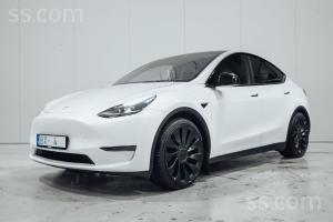 White Tesla Model Y 2022 in Riga, with an engine capacity of 0.00 L and mileage of 110 thousand km for 32000 €, photo  on AUTOMOTO.COM.LV