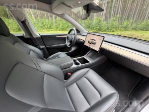 White Tesla Model Y 2022 in Riga, with an engine capacity of 0.00 L and mileage of 109 thousand km for 31900 €, photo 10 on AUTOMOTO.COM.LV