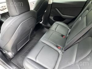 White Tesla Model Y 2022 in Riga, with an engine capacity of 0.00 L and mileage of 109 thousand km for 31900 €, photo 14 on AUTOMOTO.COM.LV