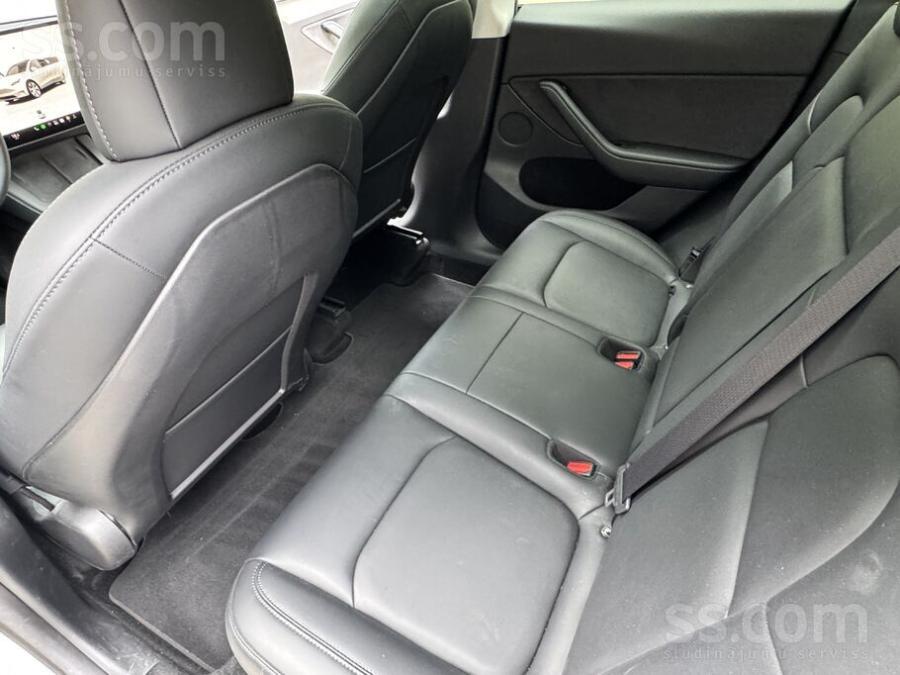 White Tesla Model Y 2022 in Riga, with an engine capacity of 0.00 L and mileage of 109 thousand km for 31900 €, photo 14 on AUTOMOTO.COM.LV