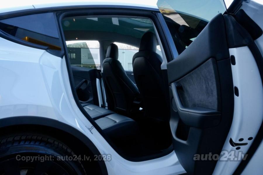 Balts Tesla Model Y 2021 Tallina, ar dzinēja tilpumu 0.00 L un nobraukumu 89 tūkst. km par 29990 €, foto 10 vietnē AUTOMOTO.COM.LV