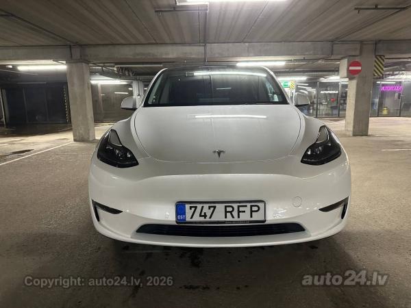 White Tesla Model Y 2021 in Tallinn, with an engine capacity of 0.00 L and mileage of 72 thousand km for 33000 €, photo 2 on AUTOMOTO.COM.LV