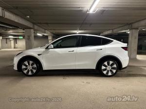 White Tesla Model Y 2021 in Tallinn, with an engine capacity of 0.00 L and mileage of 72 thousand km for 33000 €, photo 7 on AUTOMOTO.COM.LV