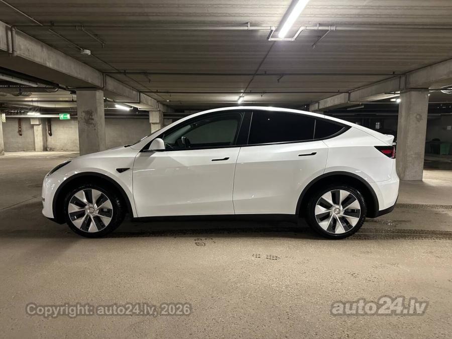 White Tesla Model Y 2021 in Tallinn, with an engine capacity of 0.00 L and mileage of 72 thousand km for 33000 €, photo 7 on AUTOMOTO.COM.LV