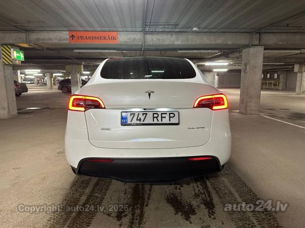 White Tesla Model Y 2021 in Tallinn, with an engine capacity of 0.00 L and mileage of 72 thousand km for 33000 €, photo 8 on AUTOMOTO.COM.LV