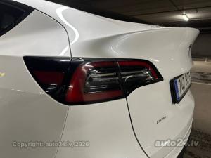 White Tesla Model Y 2021 in Tallinn, with an engine capacity of 0.00 L and mileage of 72 thousand km for 33000 €, photo 11 on AUTOMOTO.COM.LV