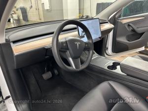 White Tesla Model Y 2021 in Tallinn, with an engine capacity of 0.00 L and mileage of 72 thousand km for 33000 €, photo 14 on AUTOMOTO.COM.LV