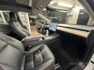 White Tesla Model Y 2021 in Tallinn, with an engine capacity of 0.00 L and mileage of 72 thousand km for 33000 €, photo 15 on AUTOMOTO.COM.LV