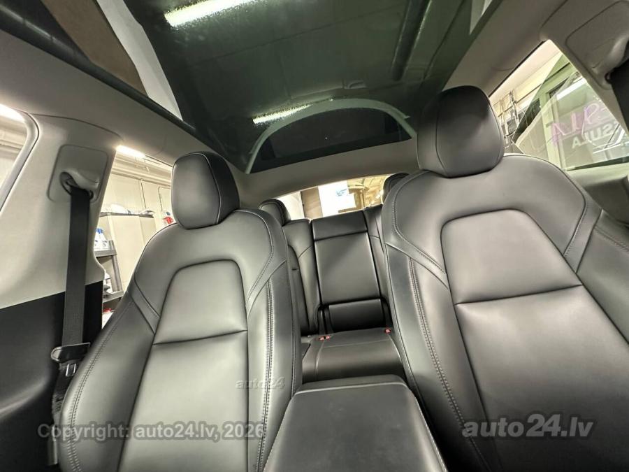 White Tesla Model Y 2021 in Tallinn, with an engine capacity of 0.00 L and mileage of 72 thousand km for 33000 €, photo 17 on AUTOMOTO.COM.LV